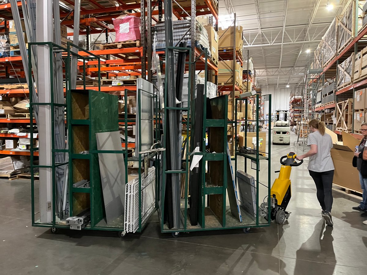 Moving Heavy Loads: Manual Handling vs Electric Tugs