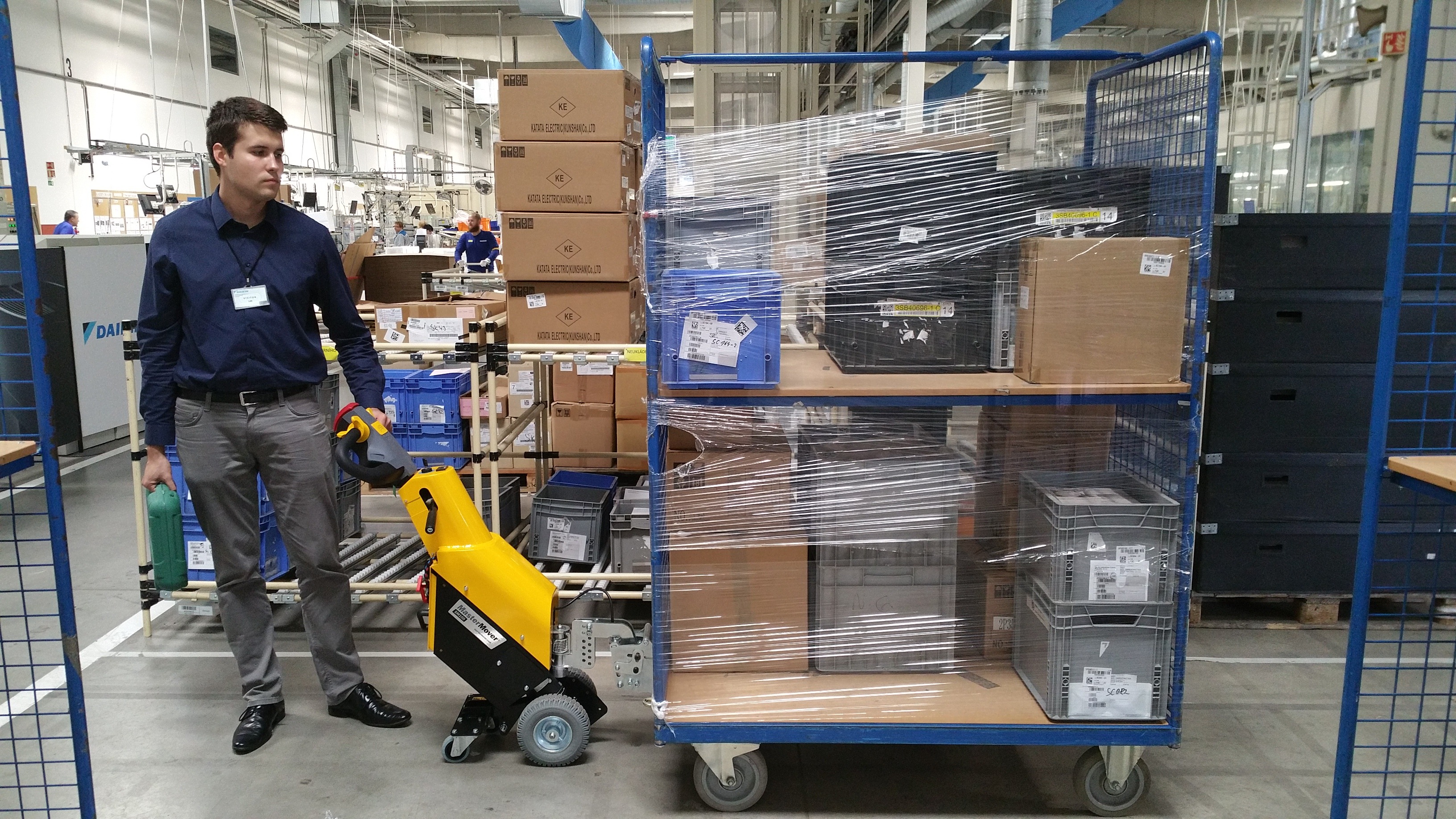 Moving Heavy Loads: Manual Handling vs Powered Tuggers